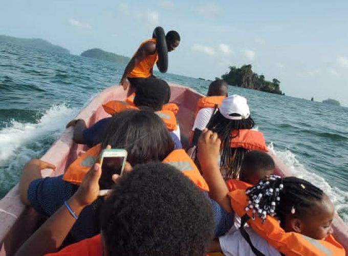 Campfire at the edge of the Lobé Falls - Yengafrica